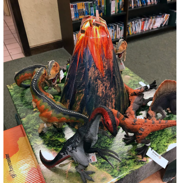 Dinosaur Display Erupts In-Store - Point of Purchase International Network